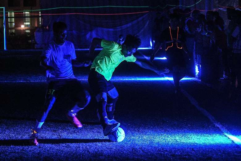 Racial harmony shines in glow-in-the-dark soccer game – THYE HUA KWAN ...